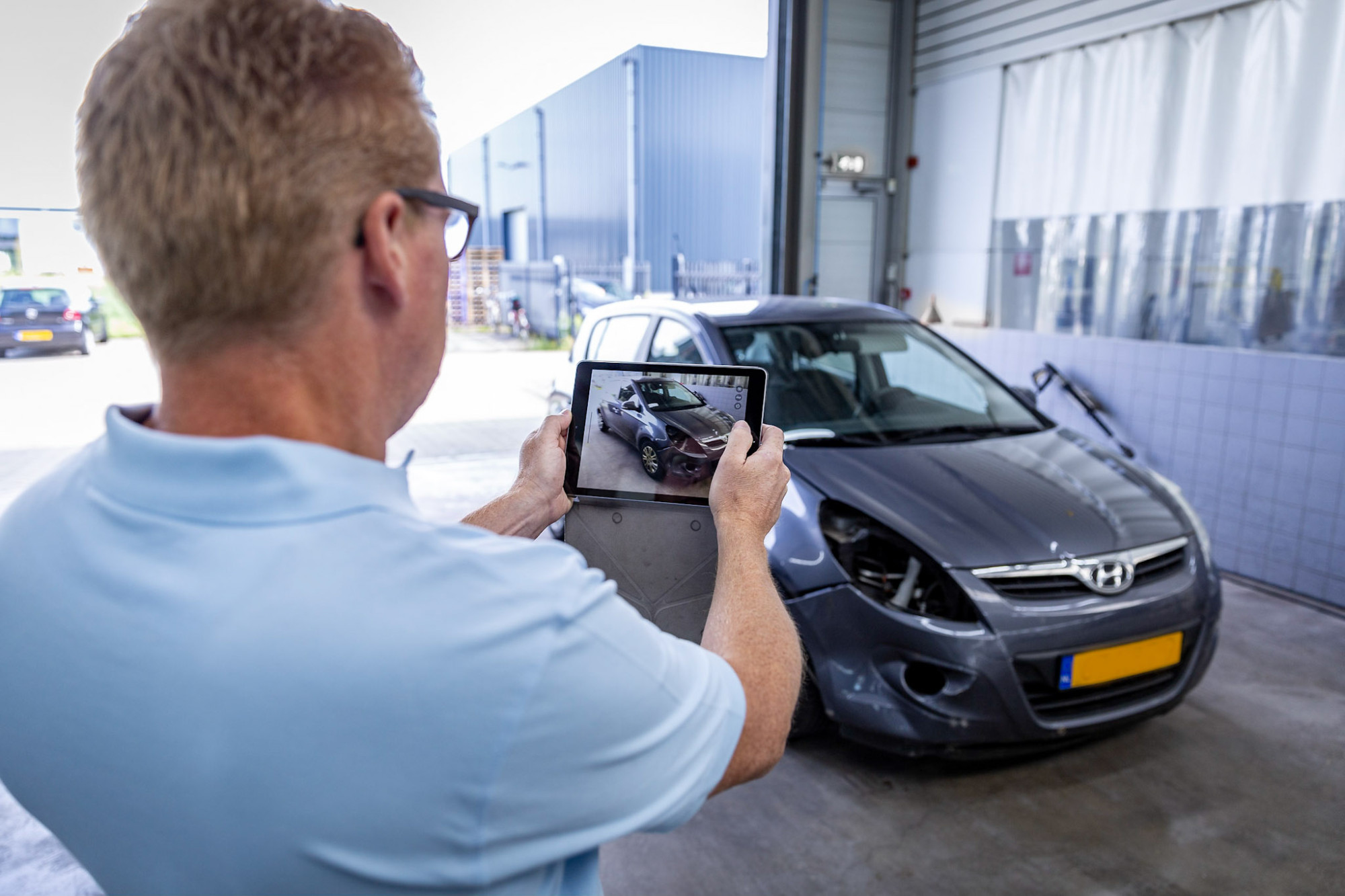 Auto Hoogenboom Schadeherstel Spijkenisse | Trots Lid van A.A.S.